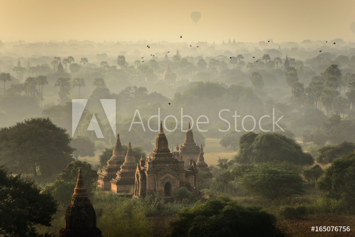 Papier peint photo Sunrise scene at pagoda ancient city field in Bagan ...