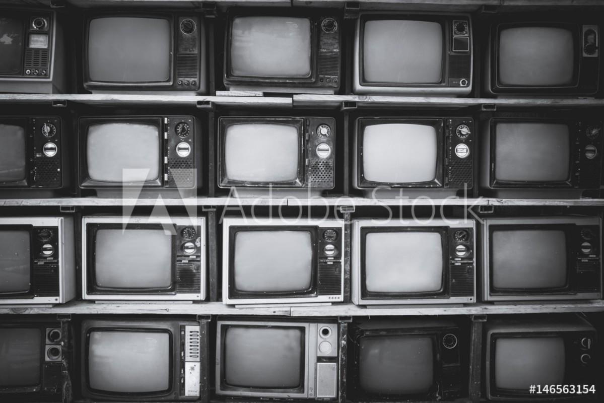 Wall mural Pattern wall of pile black and white retro television TV ...